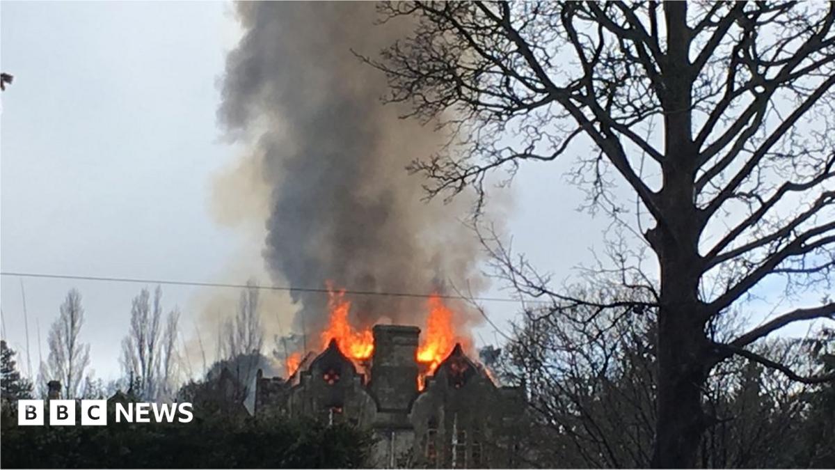Derelict Denbigh Hospital fire thought to be deliberate - BBC News