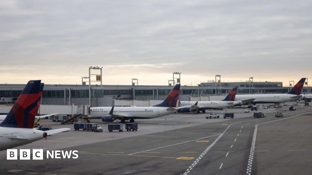 FAA investigates after two planes nearly collide on JFK runway - BBC News