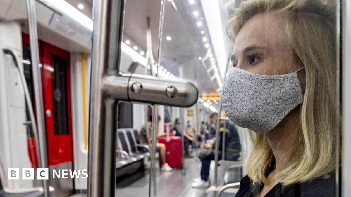 Coronavirus: Netherlands makes face masks mandatory indoors - BBC News