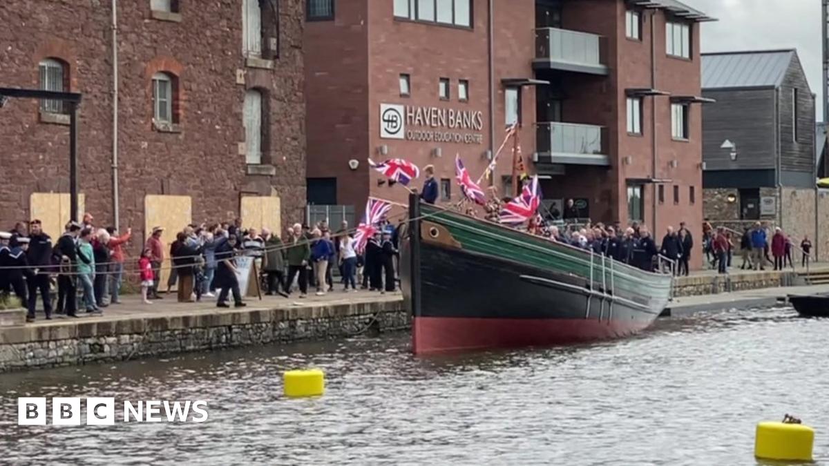 Century-old Devon fishing boat sets sail after restoration - BBC News