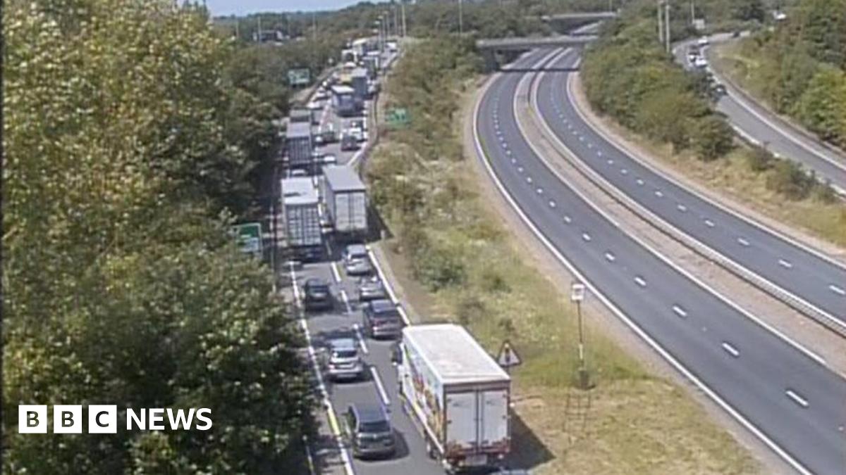 A14: Man arrested after lorry overturned released on bail - BBC News