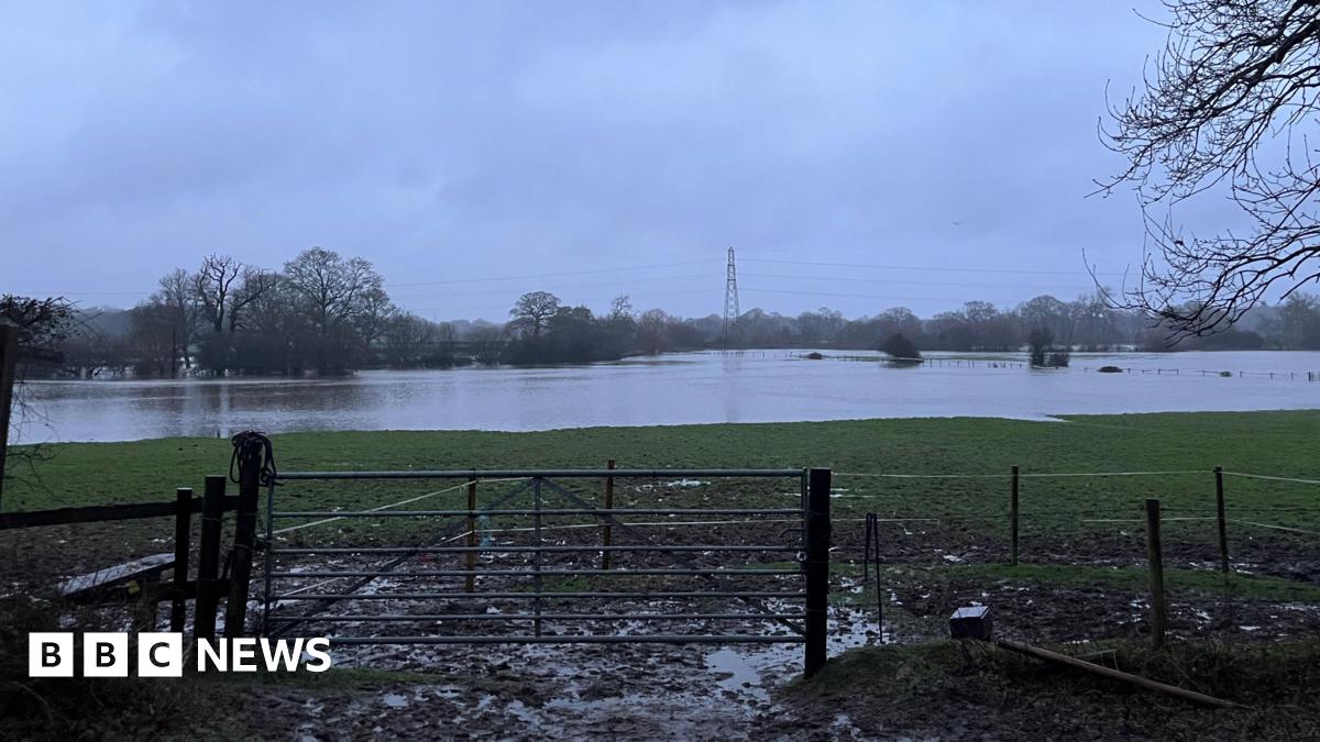 Crematorium and travel affected by Surrey flooding - BBC News