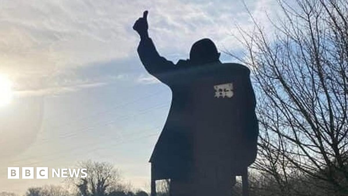Woman admits defacing Captain Sir Tom Moore memorial - BBC News