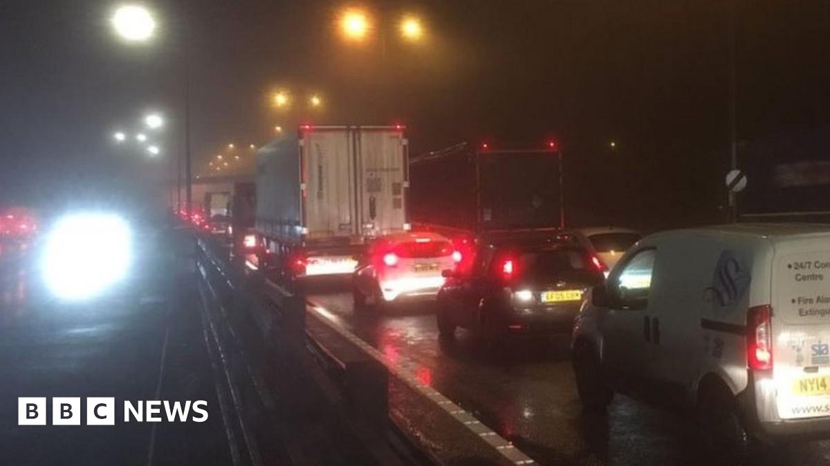 Crane hits two bridges on A63 causing road chaos - BBC News