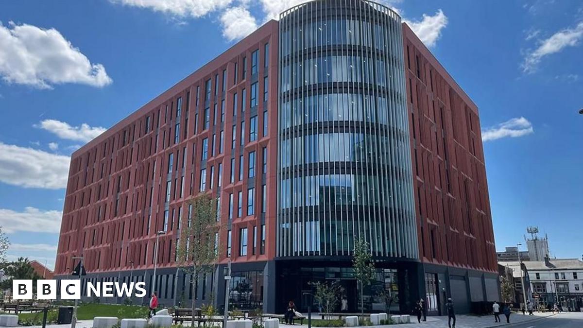Blackpool DWP office evacuated after cladding falls from building - BBC ...
