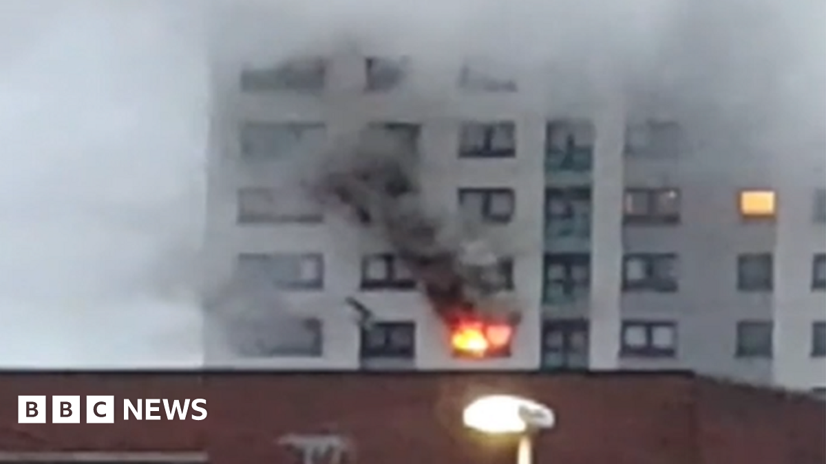 Salford tower block fire: Residents evacuated from flats - BBC News
