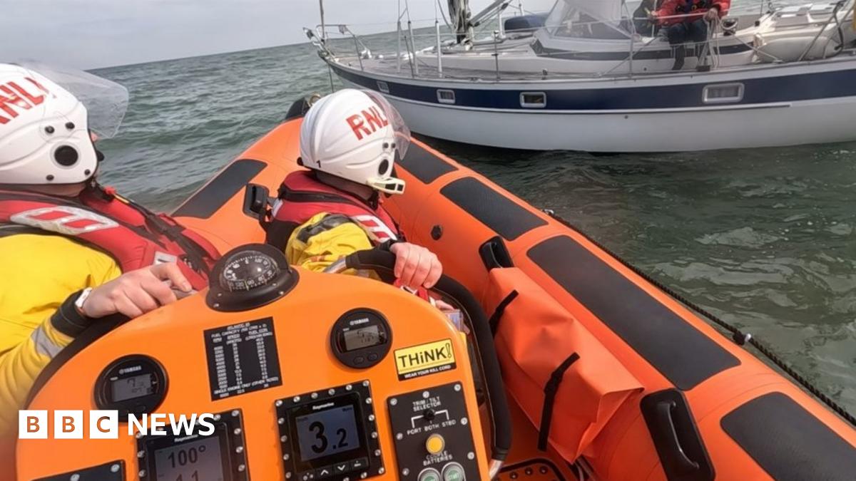 Seasick yacht crew rescued by lifeboat off Studland Bay - BBC News