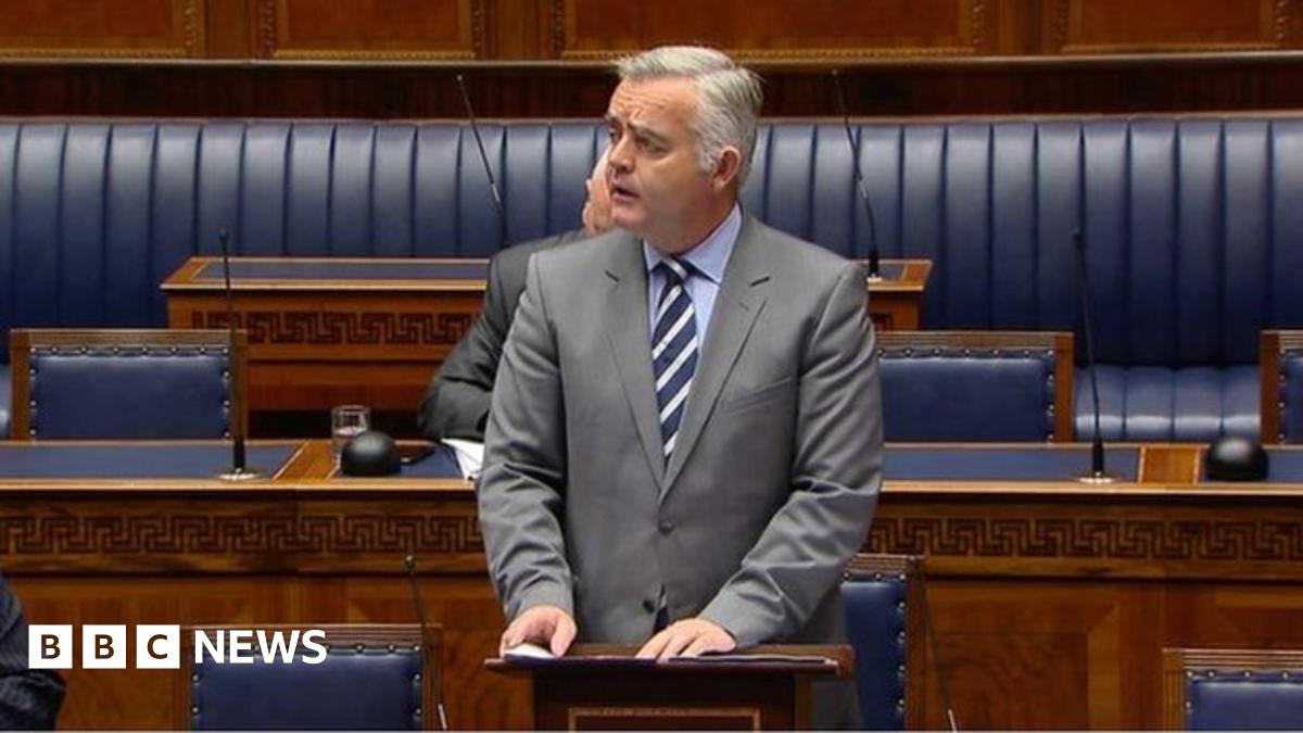 Jonathan Bell defends DUP's 'in-out' ministers policy - BBC News
