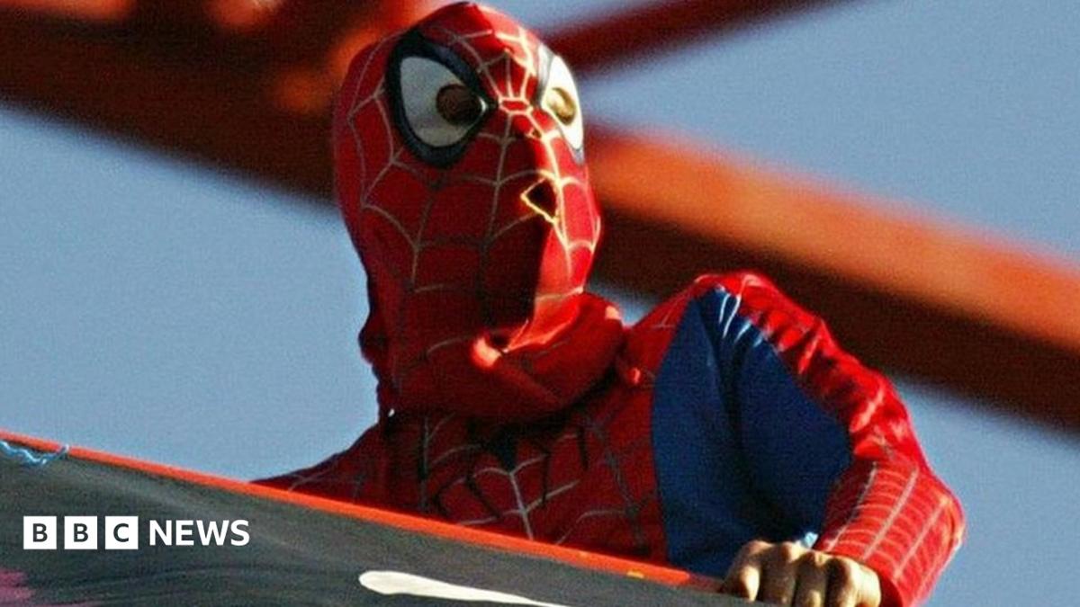 Protester jailed for Milton Keynes superhero crane stunt - BBC News