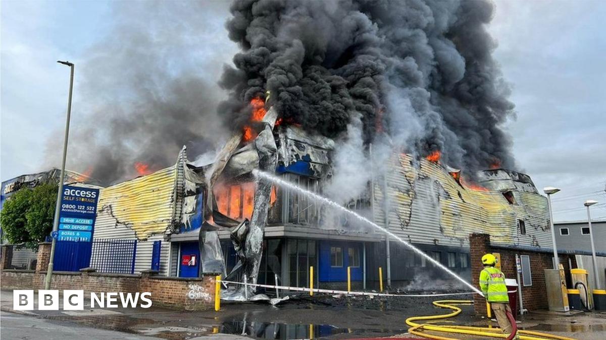 Byfleet fire: Calls for access to storage depot after fire - BBC News