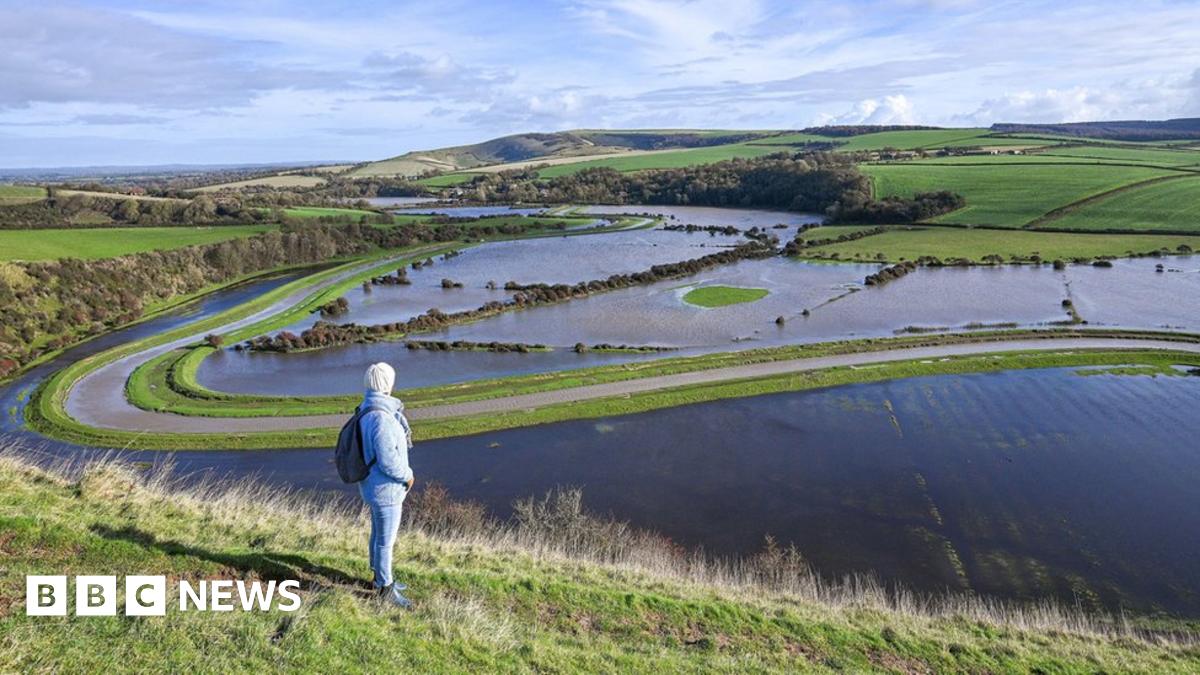 Storm Ciarán eases but flood warnings remain - BBC News