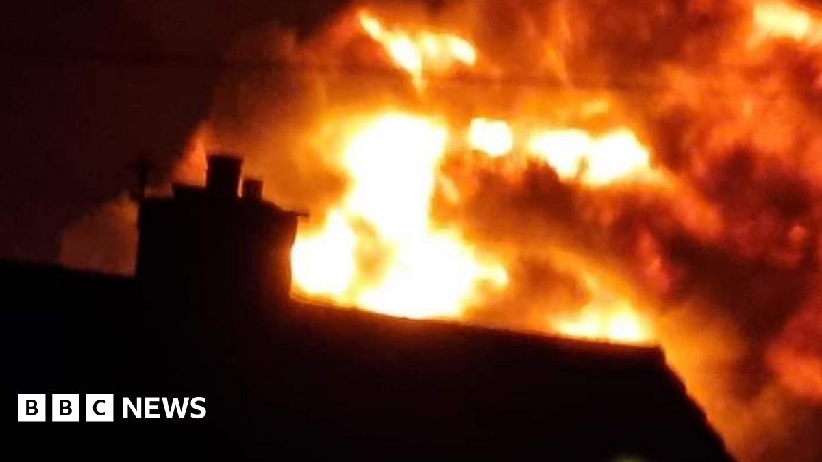 Distington residents evacuated as fire hits industrial yard - BBC News