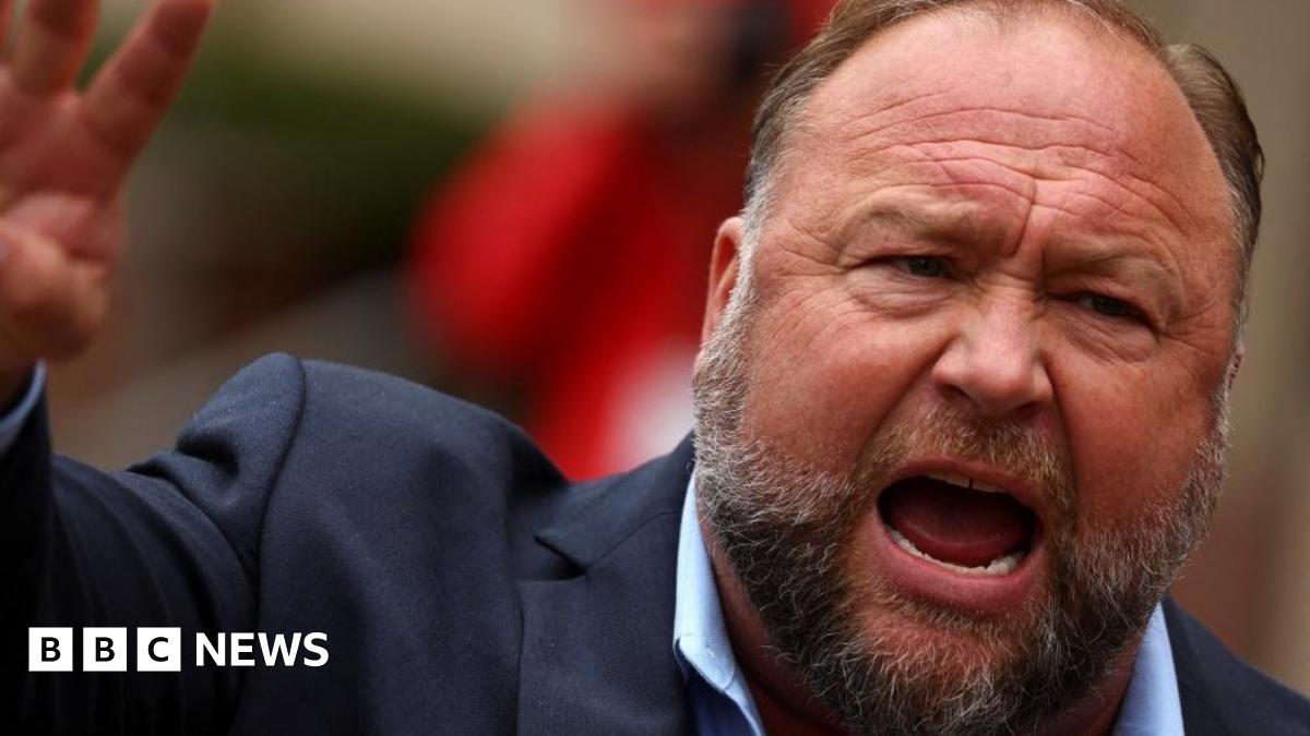 Alex Jones told to pay $965m damages to Sandy Hook victims' families ...