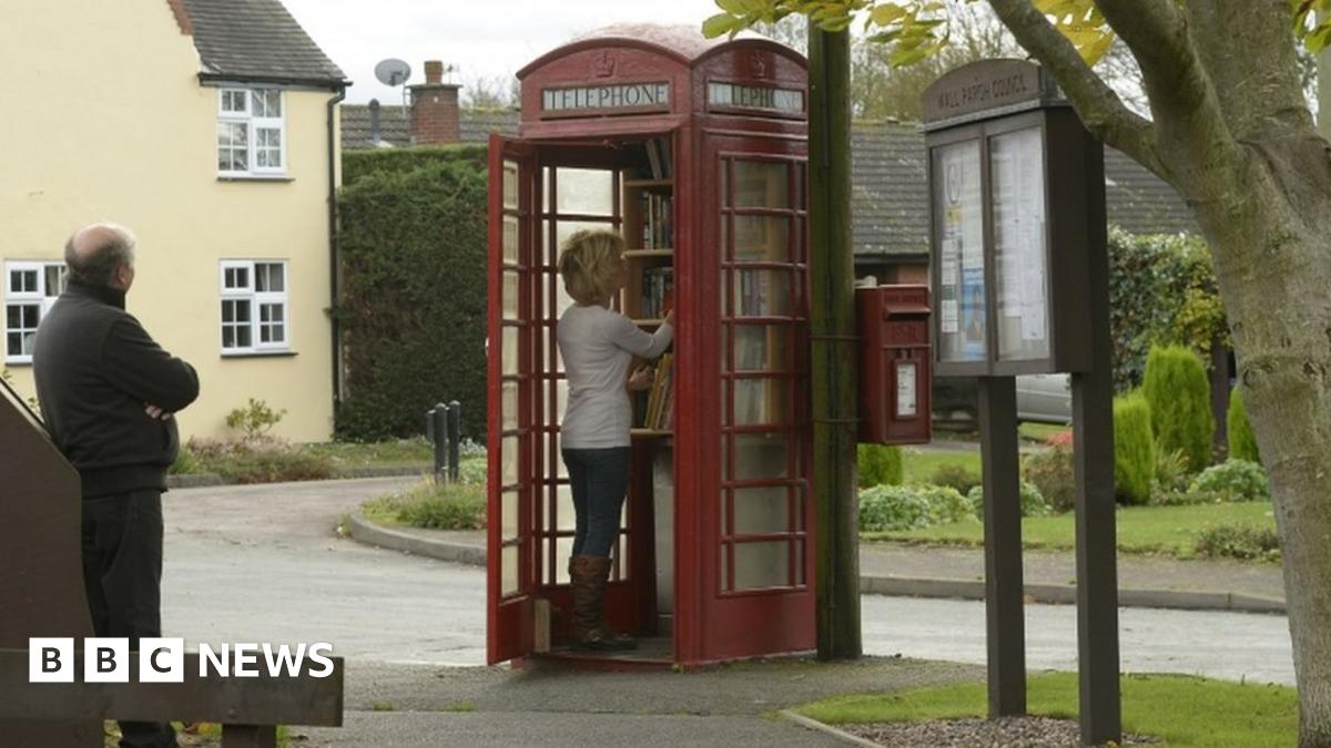 Red phone box in Wall becomes novel mini-library - BBC News