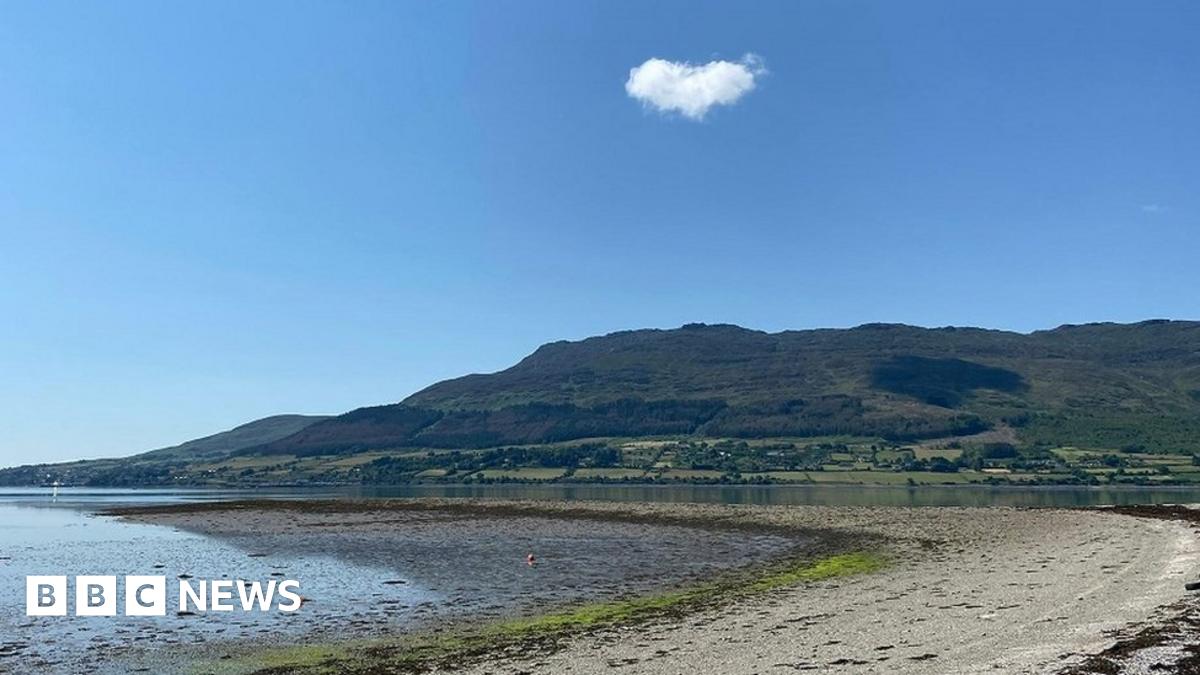 Hottest NI day ever as temperatures soar above 30C - BBC News