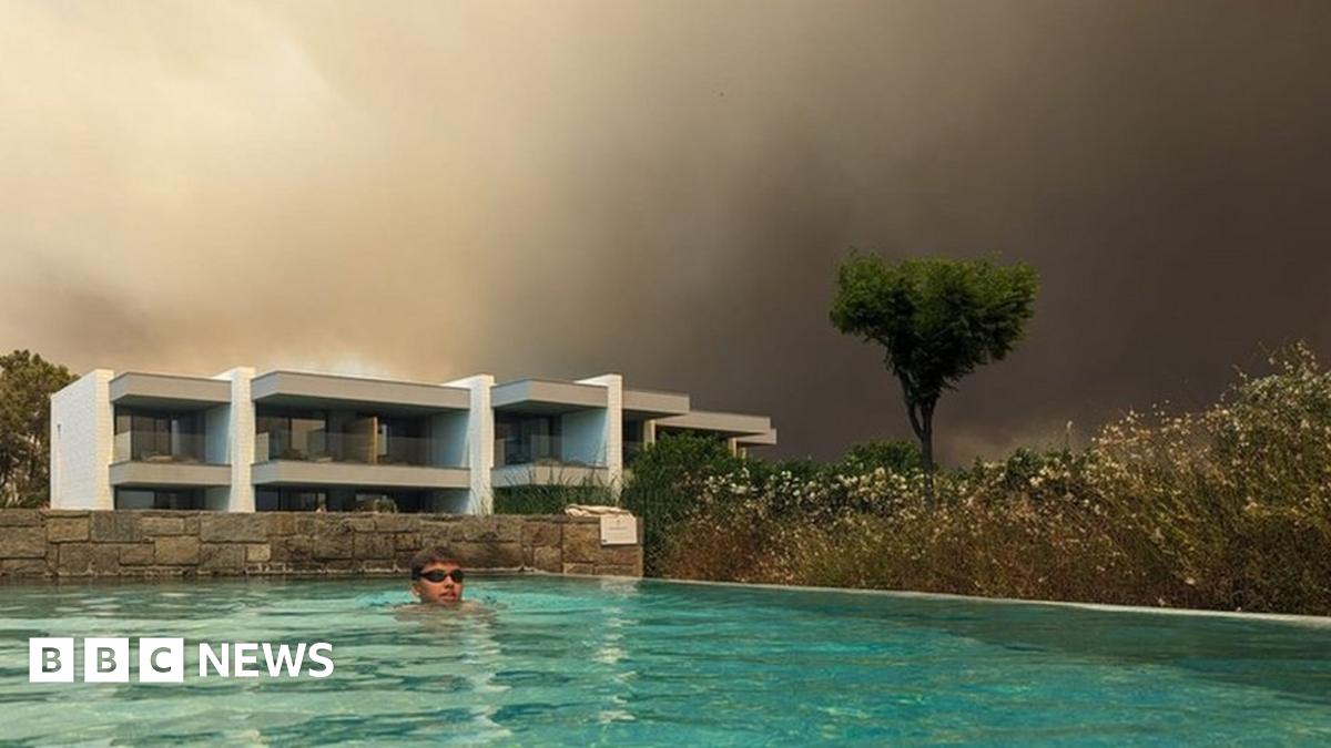 Rhodes fires: Family loaded into military dinghies in beach rescue ...