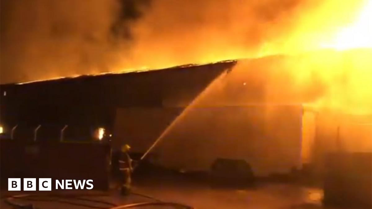 Adlington fire: Blaze tears through storage warehouse - BBC News