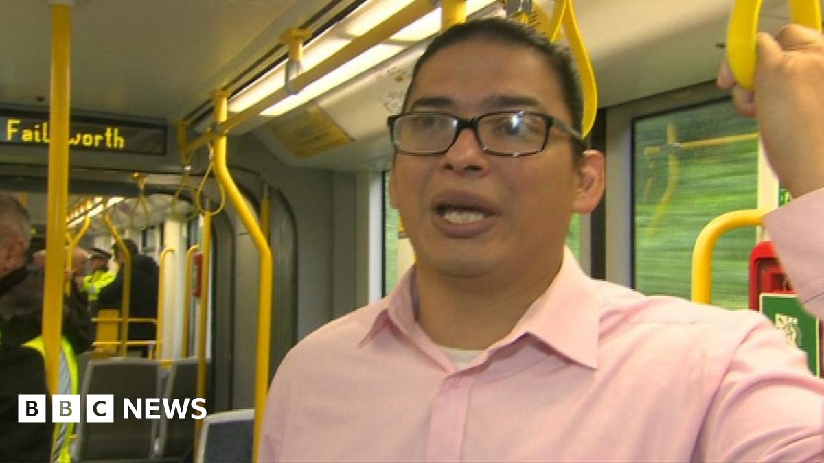 Three in court over alleged Manchester tram racist abuse - BBC News