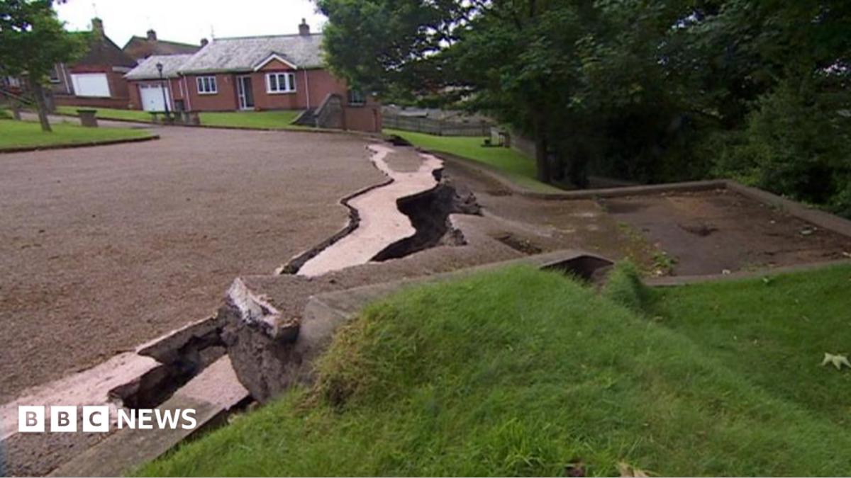 Huge cracks appear at home near new housing development - BBC News