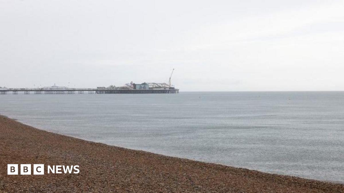 Second man arrested over rape of woman on Brighton beach - BBC News