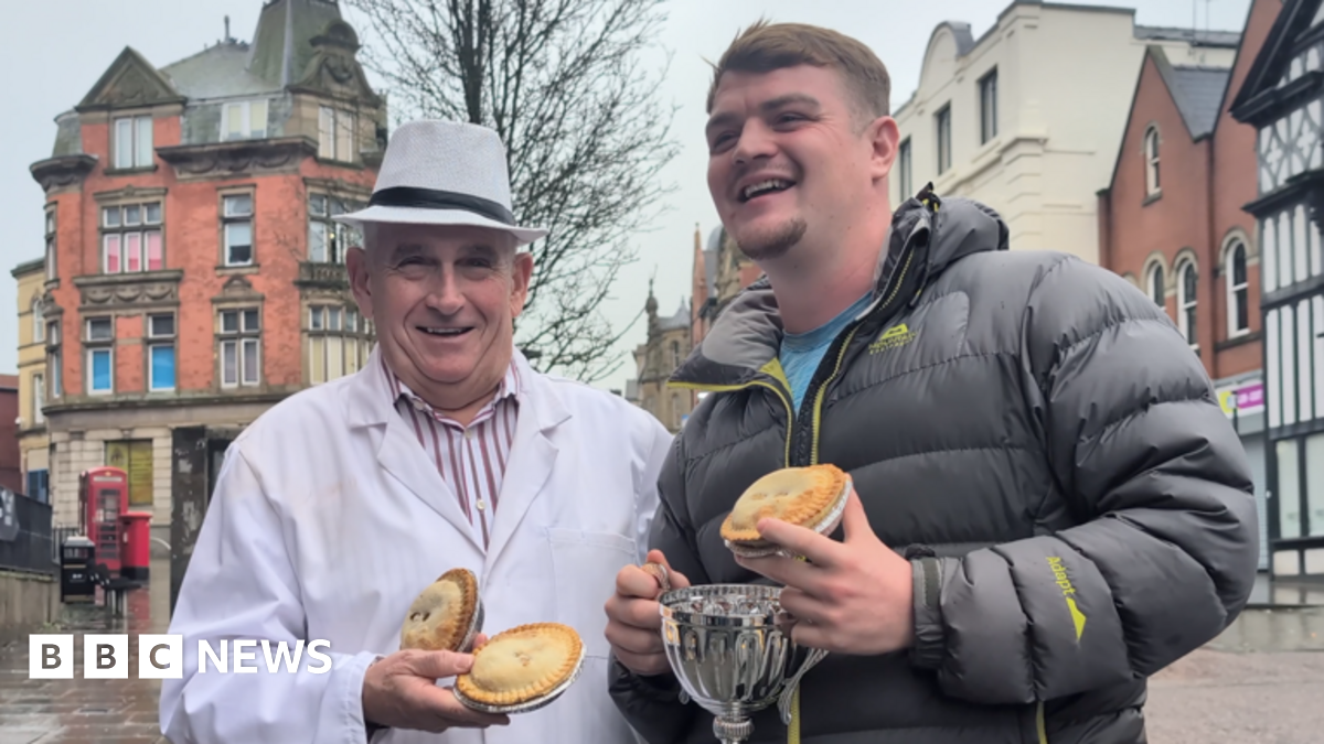 Wigan pie-eating champion polishes off pie in 64 seconds - BBC News