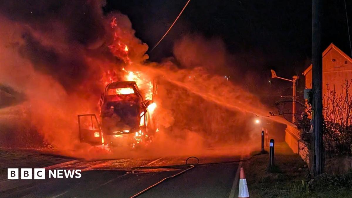 Firefighters tackle large vehicle blaze at Carland Cross - BBC News