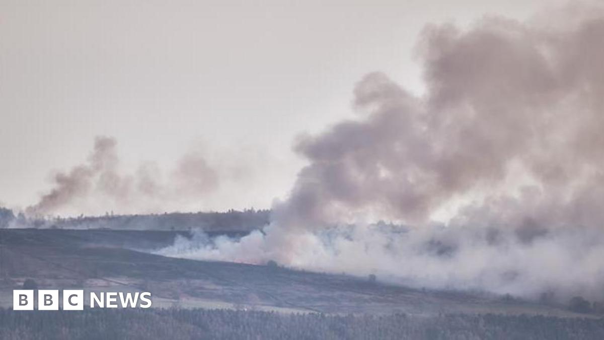 Peak District wildfire extinguished, crews say - BBC News