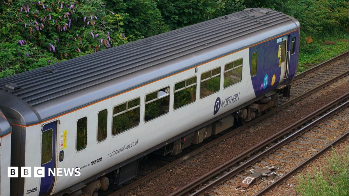 Train missed track workers by two seconds after location mix-up - BBC News