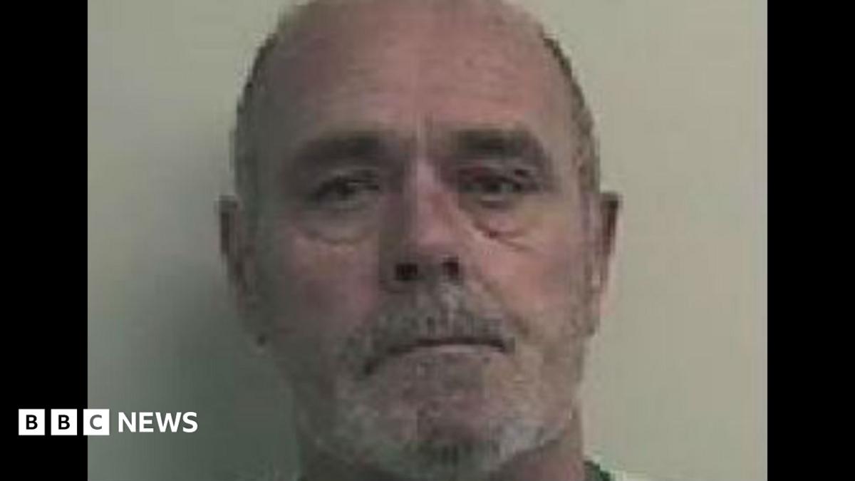 Footballer's father jailed for life over murder - BBC News