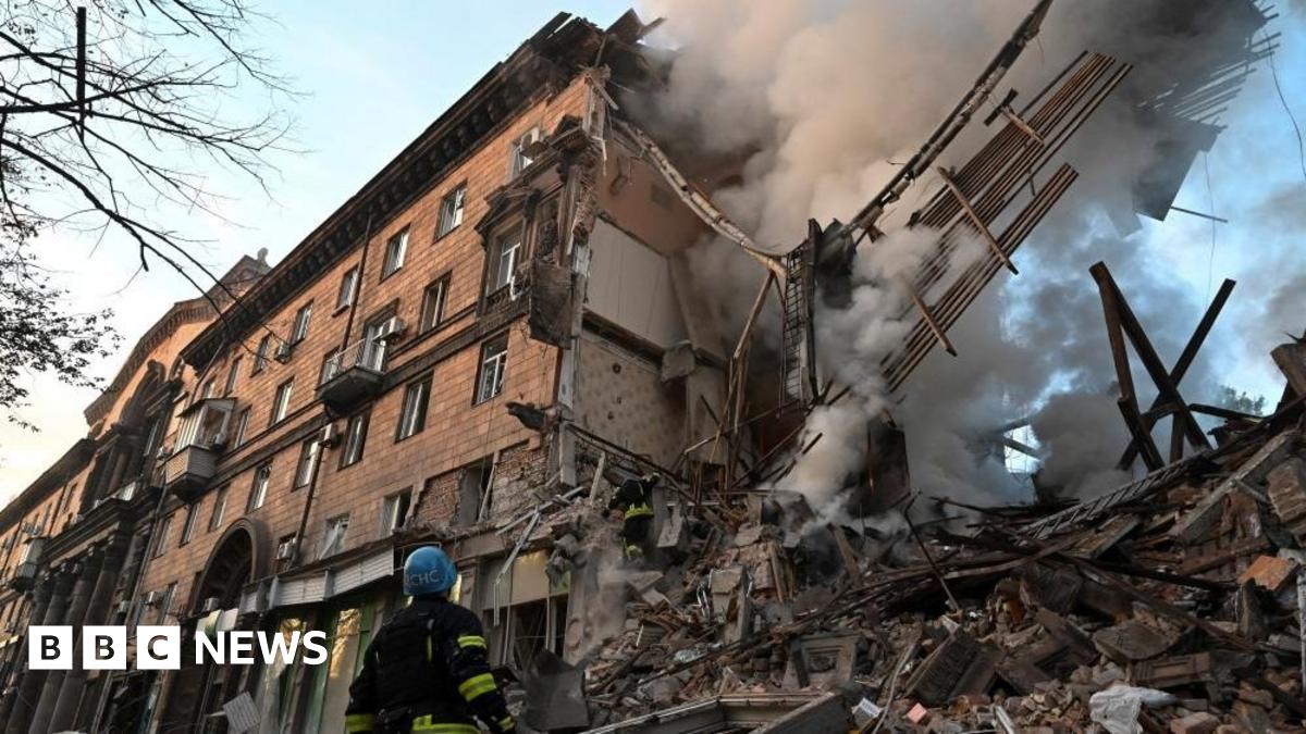 Ukraine war latest: Rescuers comb rubble after strikes on Ukraine city ...