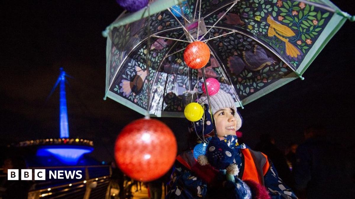 Pedestrian bridge opens with a celebration of light - BBC News
