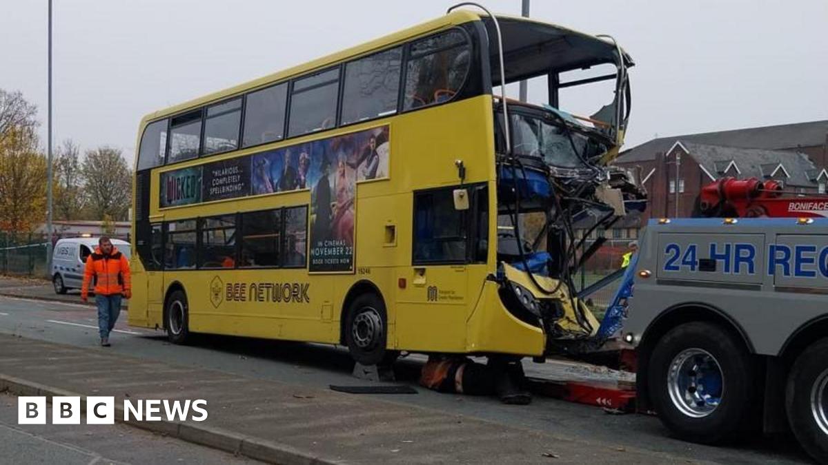 Manchester double-decker bus crash leaves 17 people injured - BBC News