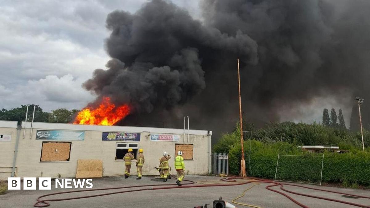 Arson investigation after former social club goes up in flames - BBC News
