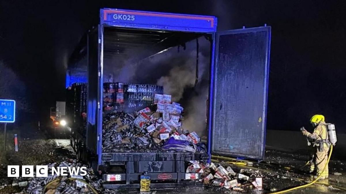 M11 lorry catches fire with 25 tonnes of beer inside - BBC News