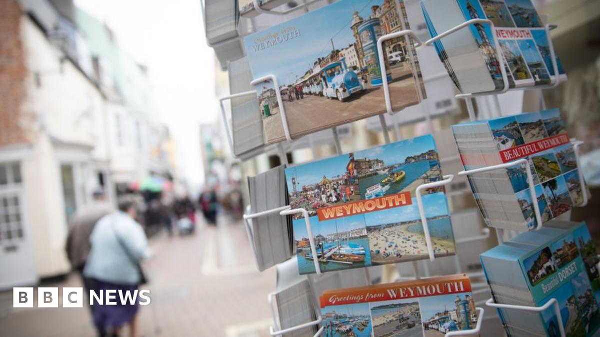 UK's oldest postcard firm set to close - BBC News