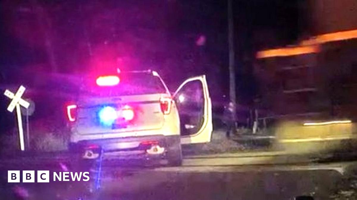 Ex-Colorado police officer who put handcuffed woman in car hit by train ...
