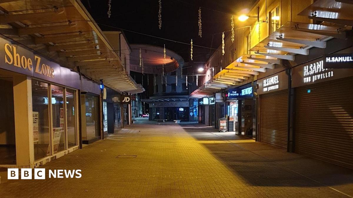 Workington business owner says kids 'climbing onto roof' - BBC News
