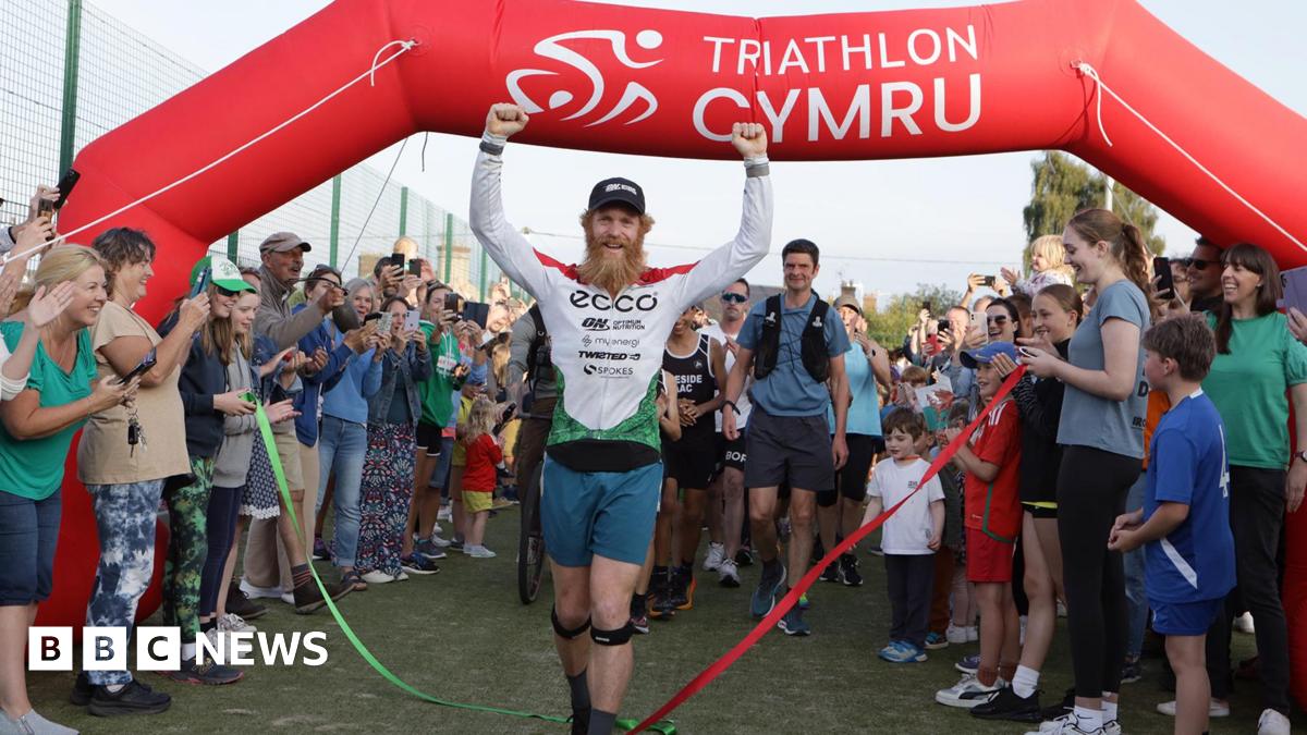 Flintshire: Man breaks ultra endurance triathlon record - BBC News