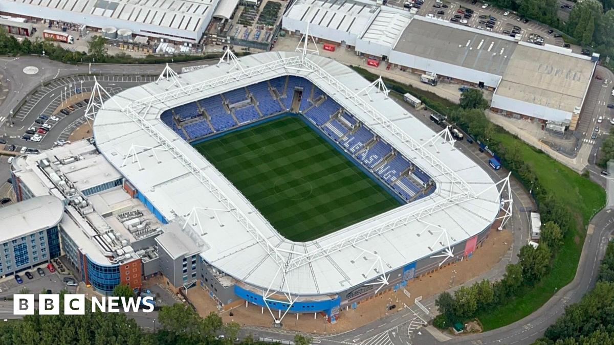 Two men charged after Reading football steward injured - BBC News