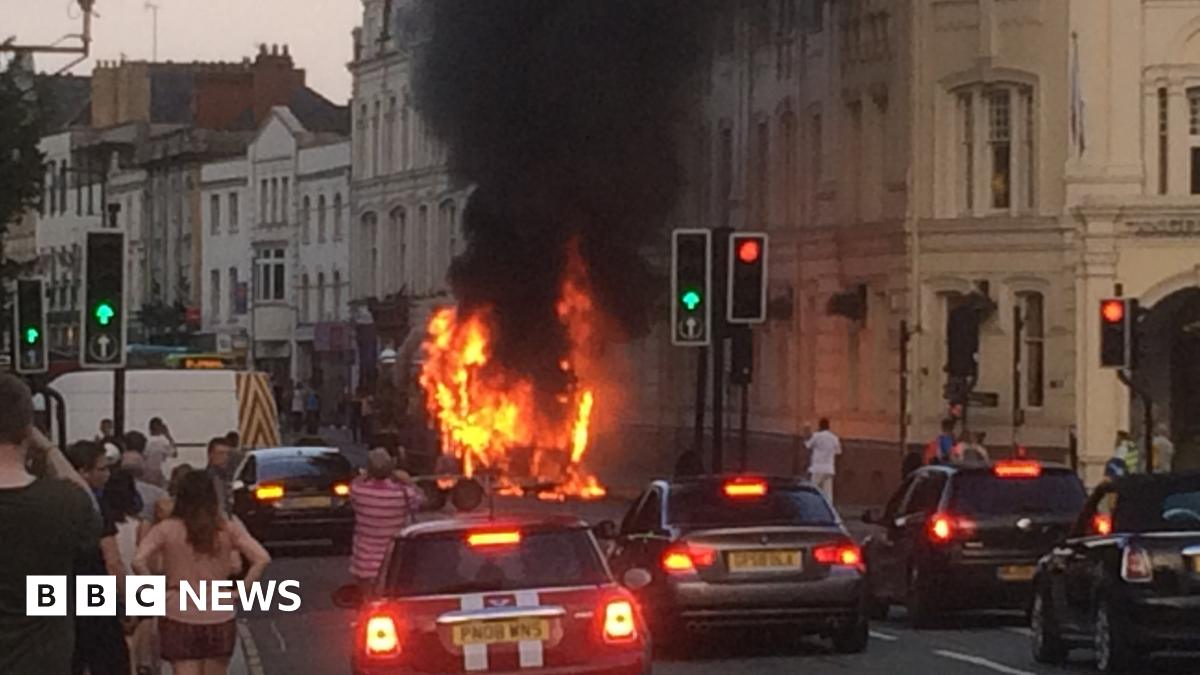 Cardiff city centre bus fire causes plumes of smoke - BBC News