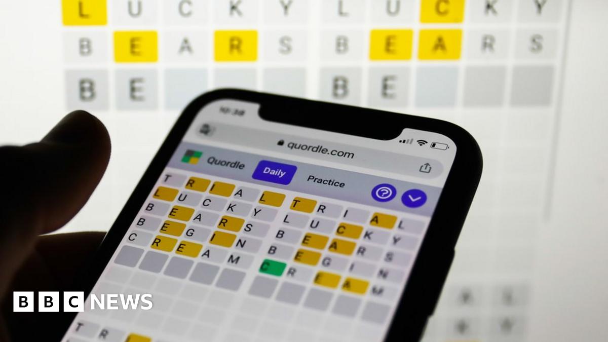 Merriam-Webster buys Wordle-style hit game Quordle - BBC News