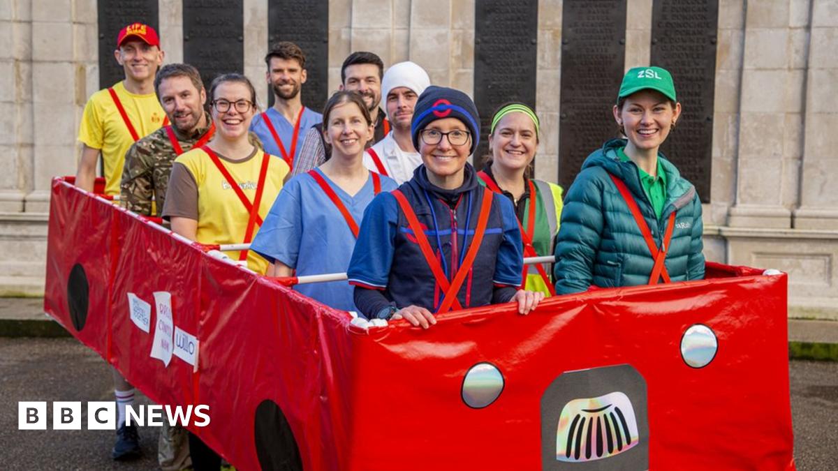 London Marathon: Group to run in 10-person bus costume - BBC News