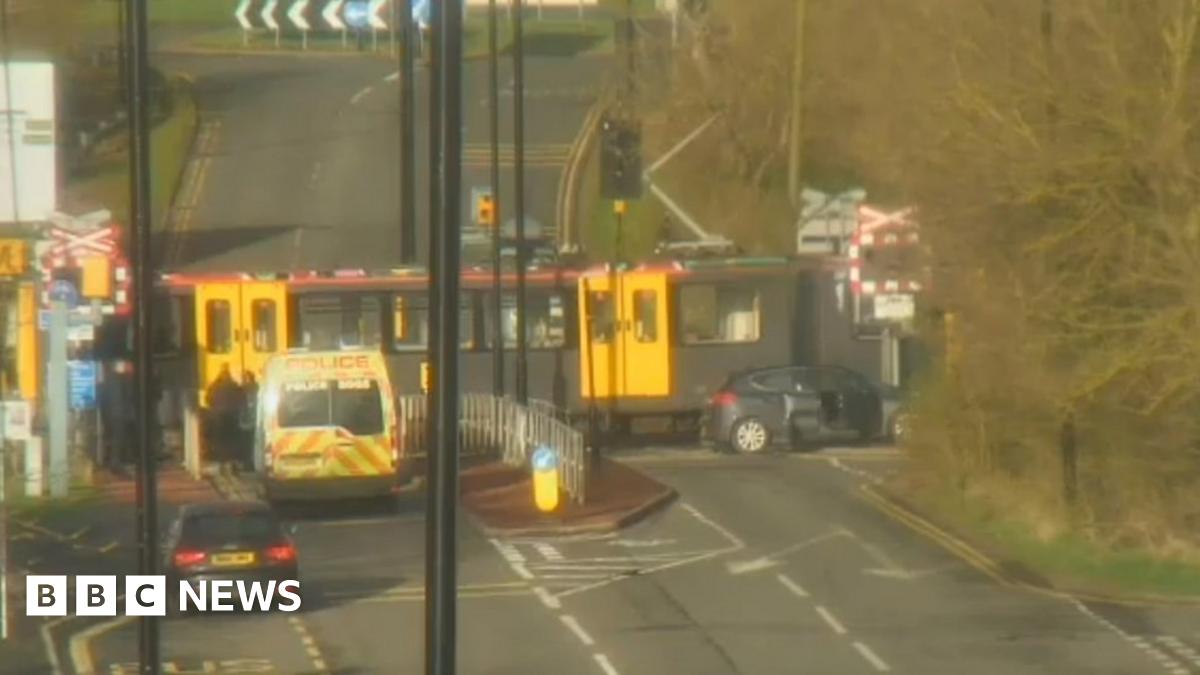 Callerton Parkway: Metro and car collide on level crossing - BBC News