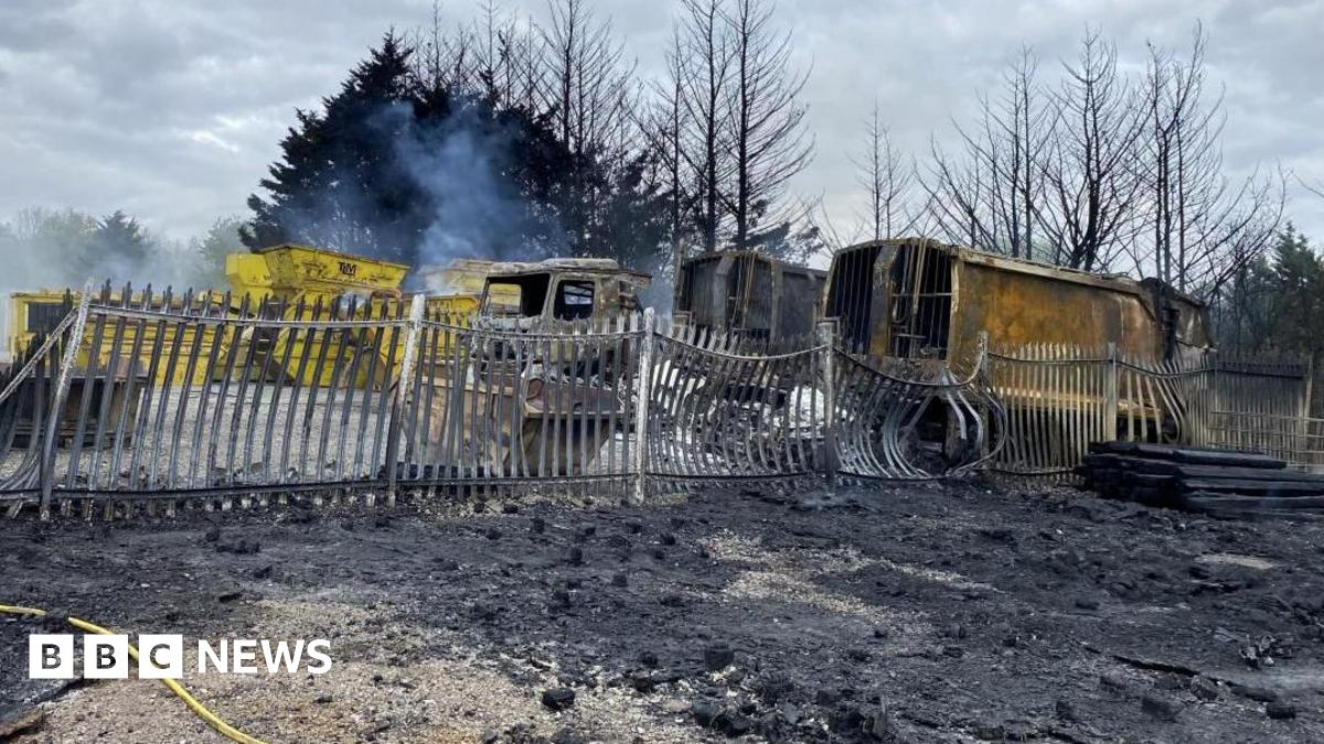 Four lorries and 10 skips badly damaged in Basildon fire - BBC News