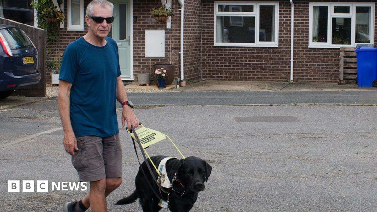 Banham Zoo apologises for turning guide dog away - BBC News