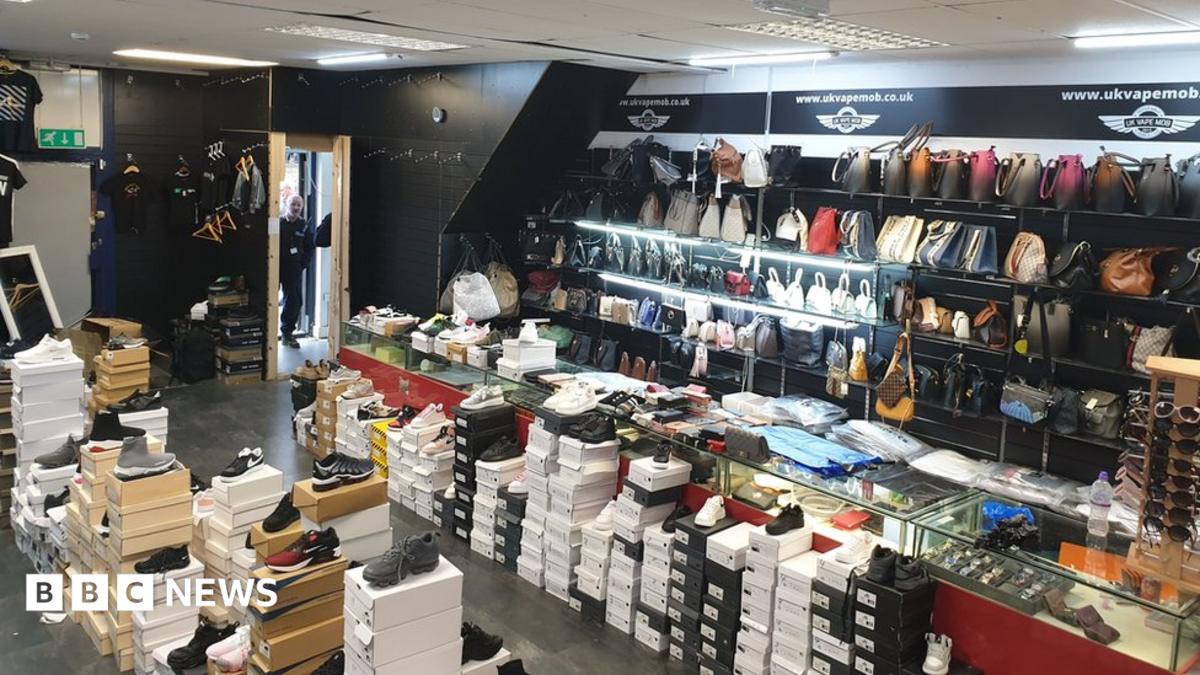 Father and son rescued from Cheetham Hill bogus goods store - BBC News