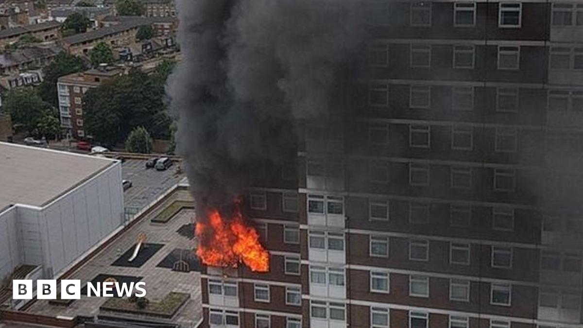 Fifty people leave flats after Shepherd's Bush tower block fire - BBC News