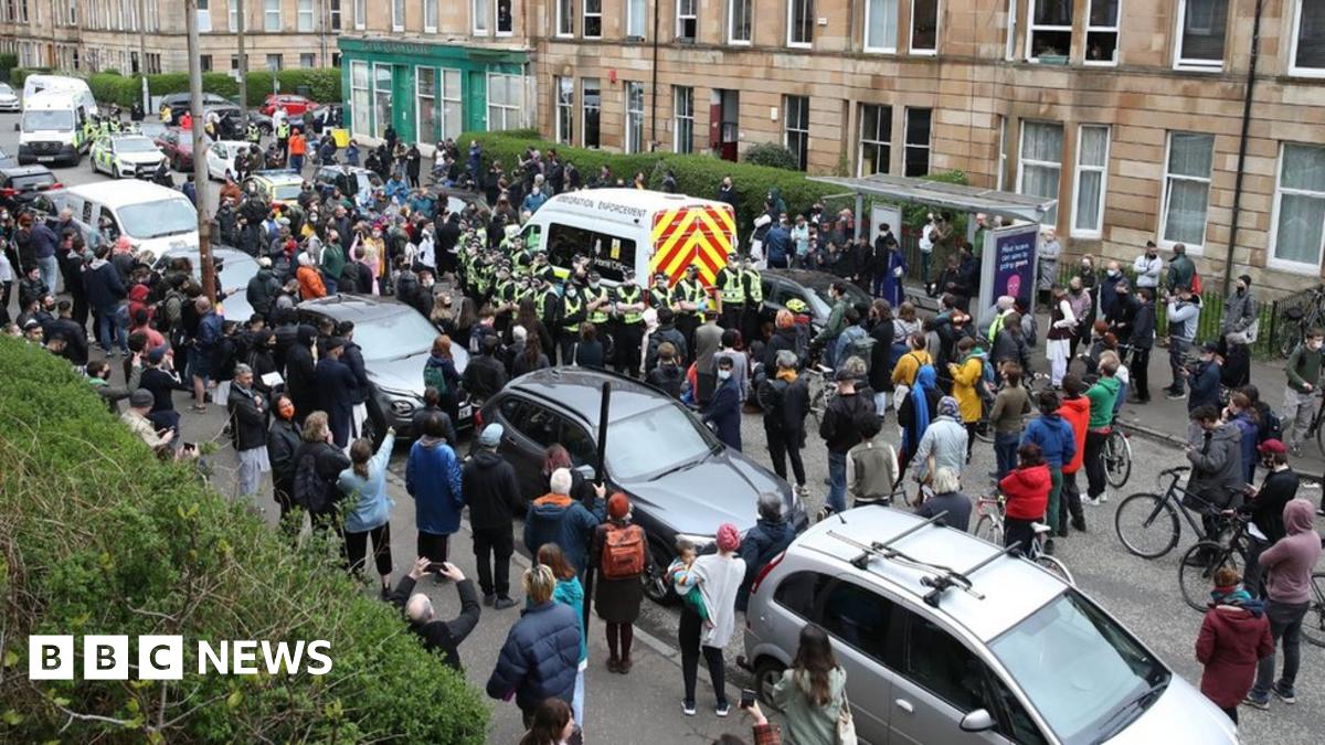 Three to stand trial after Kenmure Street protest - BBC News