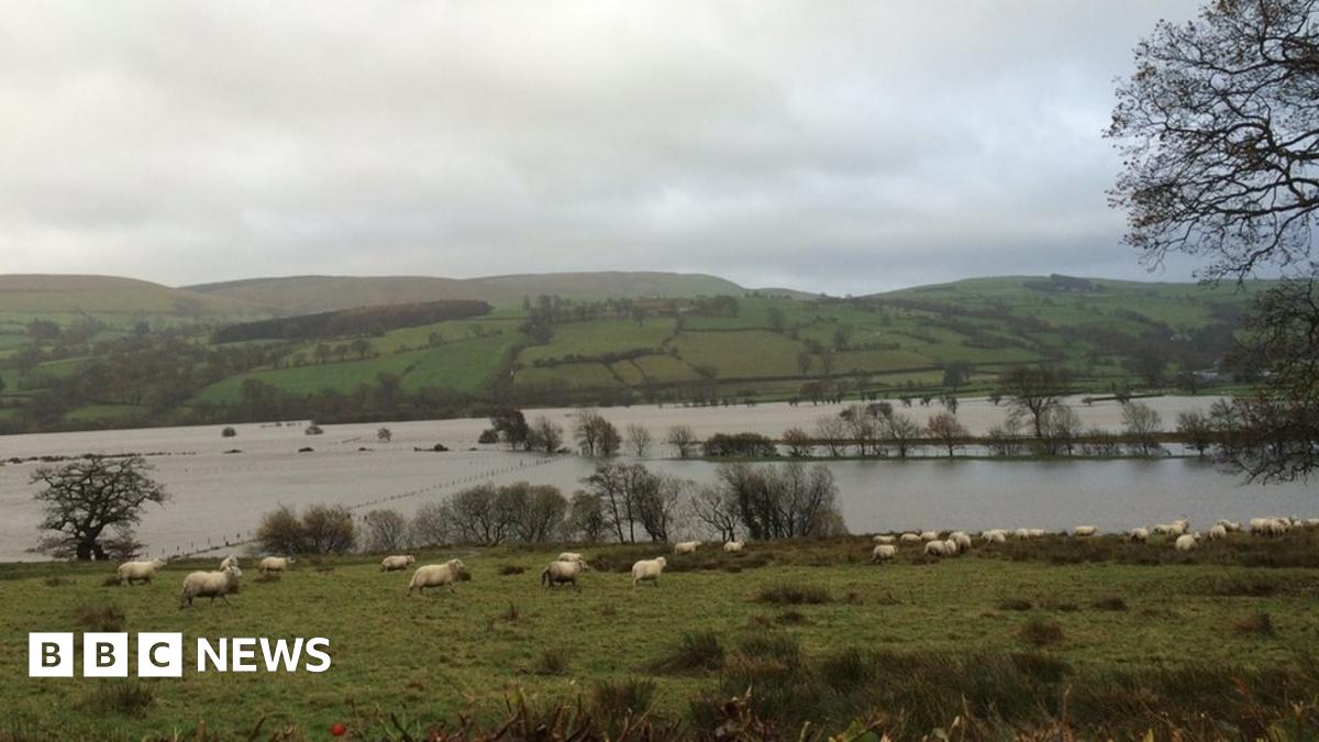 Power cuts and floods after storms hit Wales - BBC News