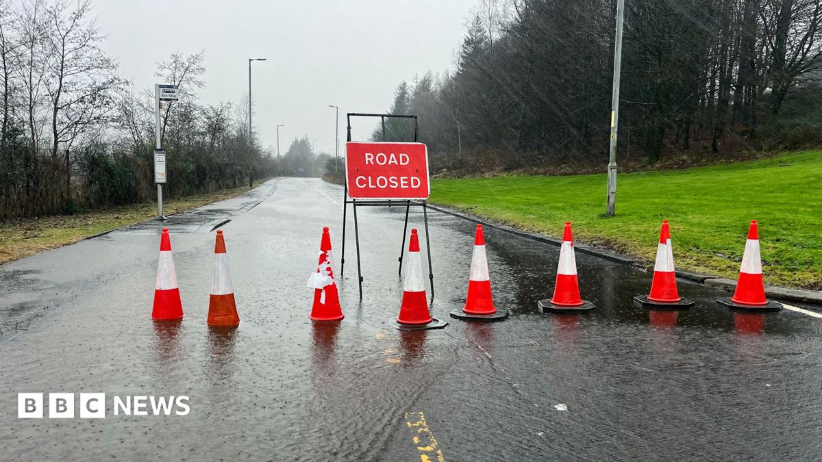 Floods fears recede as amber rain warning downgraded - BBC News